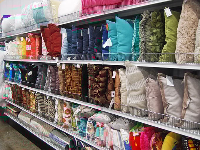 A rainbow of throw pillows awaits adoption&mdash;each one with a story to tell and a couch to transform.