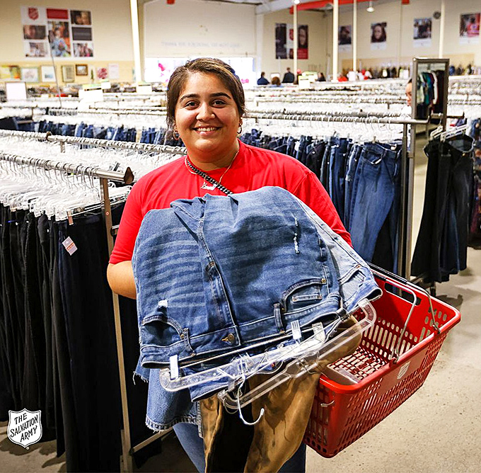 That smile says it all&mdash;she just scored an armful of denim treasures for less than a single pair costs new.
