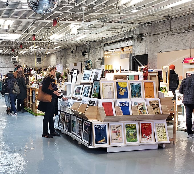 Art hunters browse through a sea of prints under industrial ceilings. That disco ball isn't just decoration&mdash;it's setting the mood for your wallet's dance party.