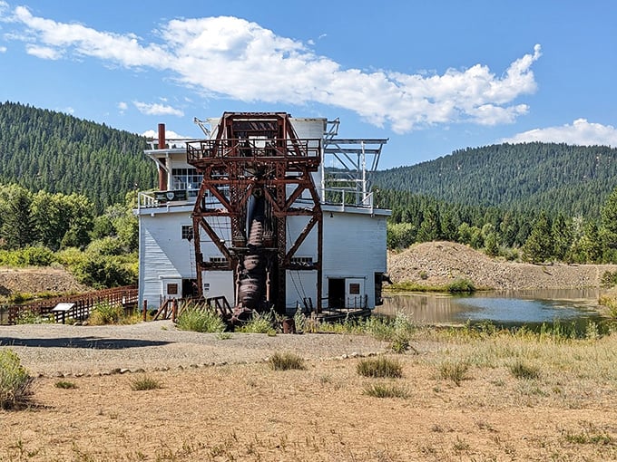 The massive Sumpter Valley Dredge stands as a hulking time capsule, its 72 one-ton buckets frozen mid-scoop like a mechanical dinosaur taking a century-long nap.