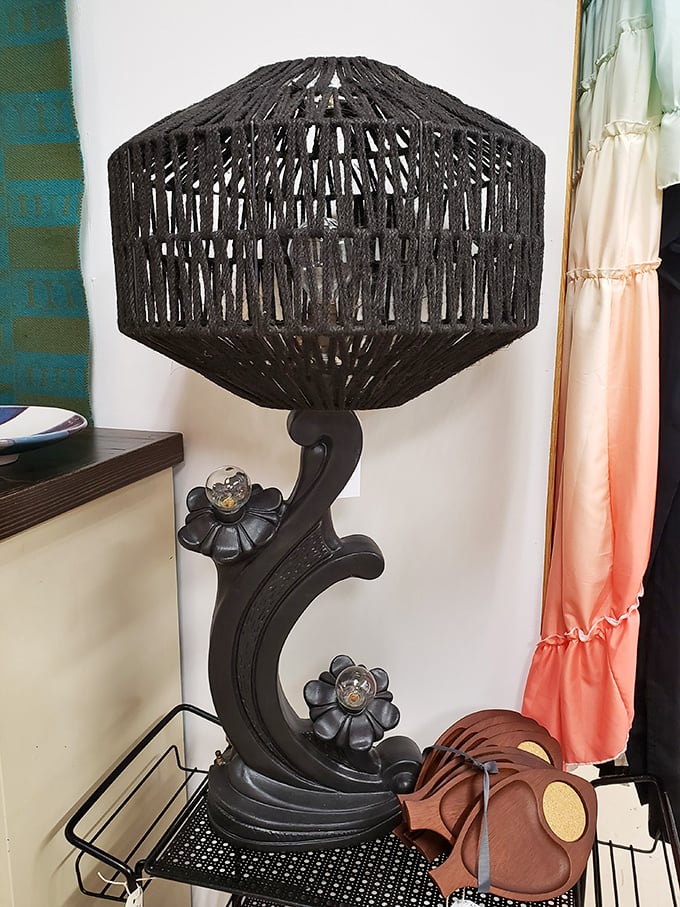 This sculptural black lamp isn't just lighting&mdash;it's conversation-starting art that whispers tales of cocktail parties from decades past.