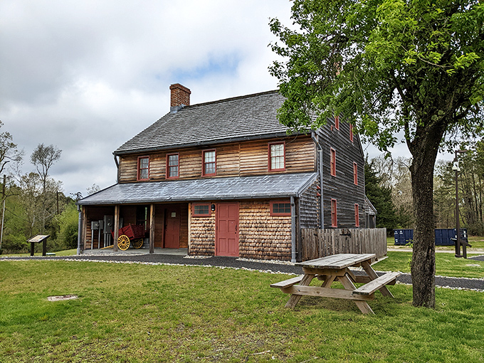 This historic wooden structure whispers stories of early American life, standing proudly as a testament to craftsmanship that predated planned obsolescence.