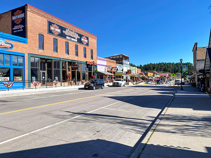 Brick buildings and blue skies create Hill City's perfect backdrop, where Harley-Davidson meets small-town hospitality.