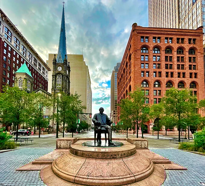 Downtown's historic charm meets modern vitality at Public Square, where a bronze statue keeps watch over centuries of Cleveland stories.