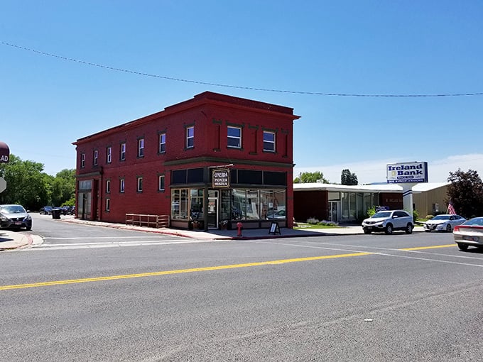 That iconic red brick building isn't just photogenic—it's a cornerstone of Malad's history, standing proudly at the intersection of past and present.