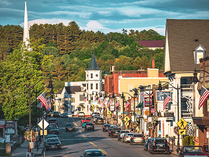 Littleton's picture-perfect Main Street vista &ndash; where American flags flutter and White Mountain views provide the ultimate small-town backdrop.