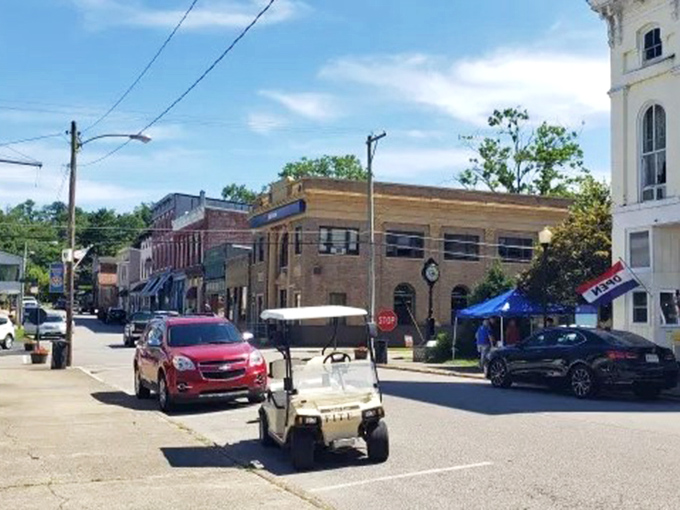 Downtown Augusta feels like stepping onto a movie set where golf carts share the road with cars and time moves at its own gentle pace.