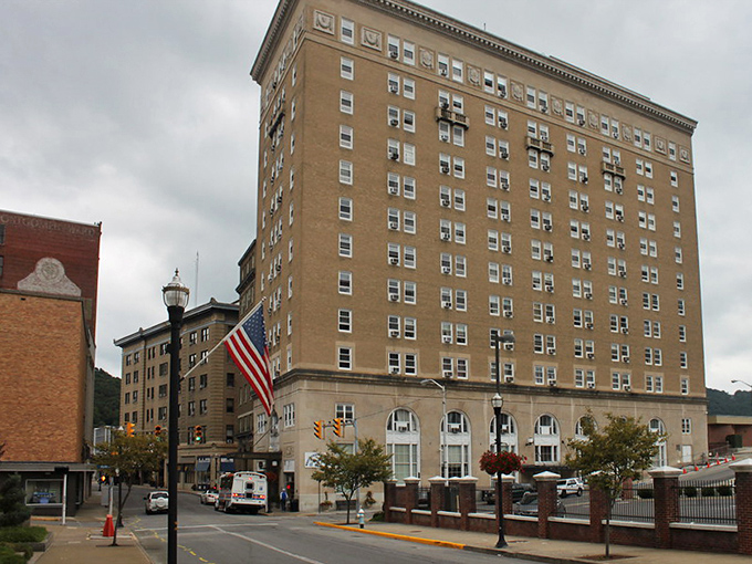 The West Virginian Hotel stands tall like a distinguished gentleman who's seen it all, a towering reminder of Bluefield's coal-boom prosperity days.