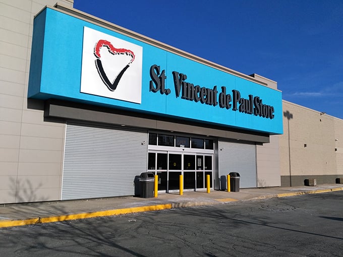 Sunshine gleams off the distinctive heart-shaped logo, a promise of both deals and doing good. Even on gray Wisconsin days, this entrance radiates thrift store optimism.