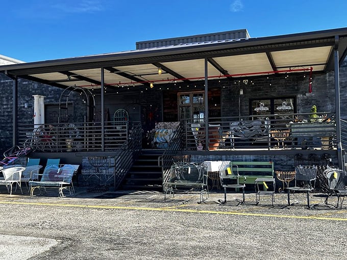 Step into yesterday through this unassuming entrance. Those garden ornaments and wrought iron pieces are just appetizers for the feast of nostalgia waiting inside.