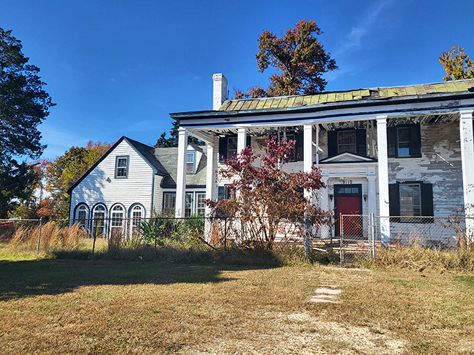 This historic white house near the market stands as a silent witness to decades of bargain hunters, its weathered facade telling stories of Virginia's past.