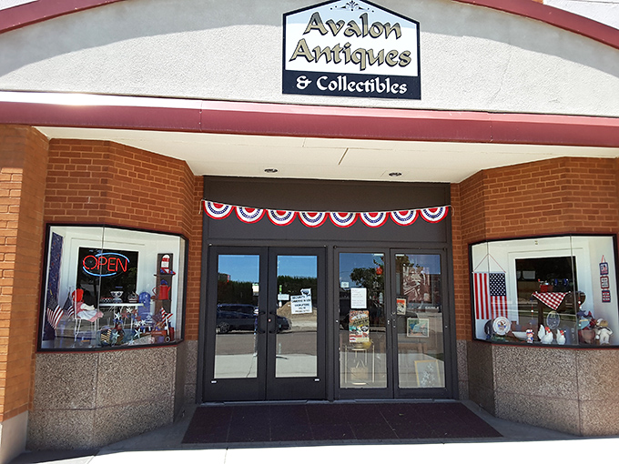 Patriotic bunting welcomes visitors to this temple of nostalgia. The "OPEN" sign might as well say "Begin Your Adventure Here."
