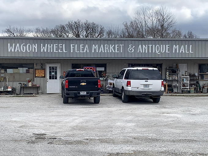The unassuming exterior of Wagon Wheel Flea Market & Antique Mall &ndash; where ordinary buildings hide extraordinary treasures, like speakeasies for vintage hunters.