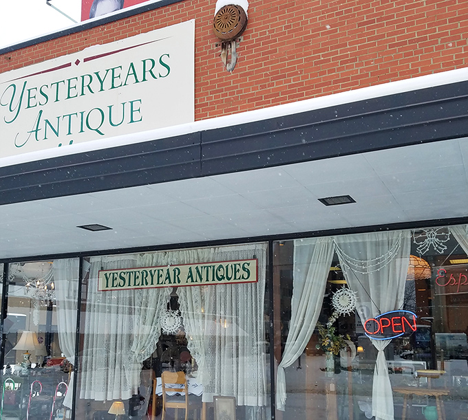 That elegant script on the sign promises what lies within&mdash;a portal to the past where your grandmother's "junk" is now someone else's priceless collectible.