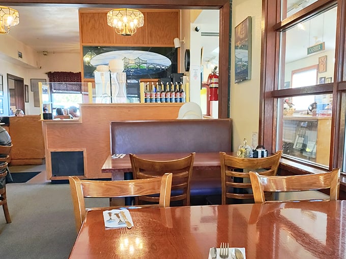 Cozy wooden booths and a glimpse of the iconic McCullough Bridge painting create that perfect "I've discovered something special" feeling that makes local diners magical.