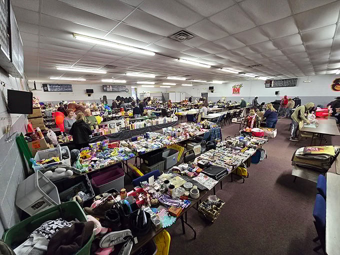 Tables stretch into infinity under fluorescent lights, each one a miniature museum of American life waiting to be explored.