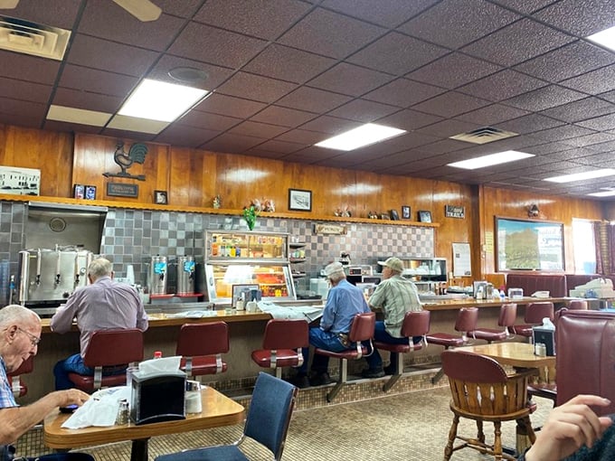 Classic wood paneling, swivel counter stools, and regulars reading newspapers &ndash; this isn't retro design, it's simply never changed, and that's precisely its charm.