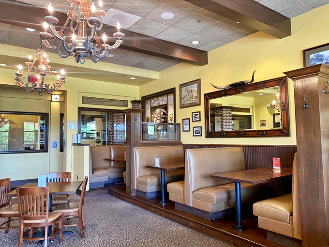 Leather booths and warm wood tones create that perfect Goldilocks zone of dining comfort—not too fancy, not too casual, just right for serious beef business.