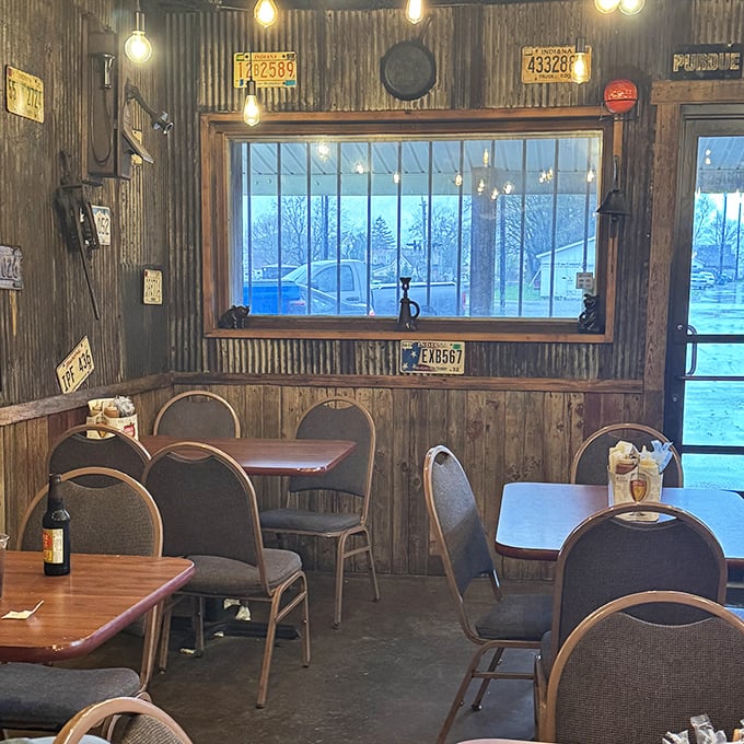 License plates and Edison bulbs create the perfect rustic backdrop for barbecue conversations that inevitably begin with "You've gotta try the..."