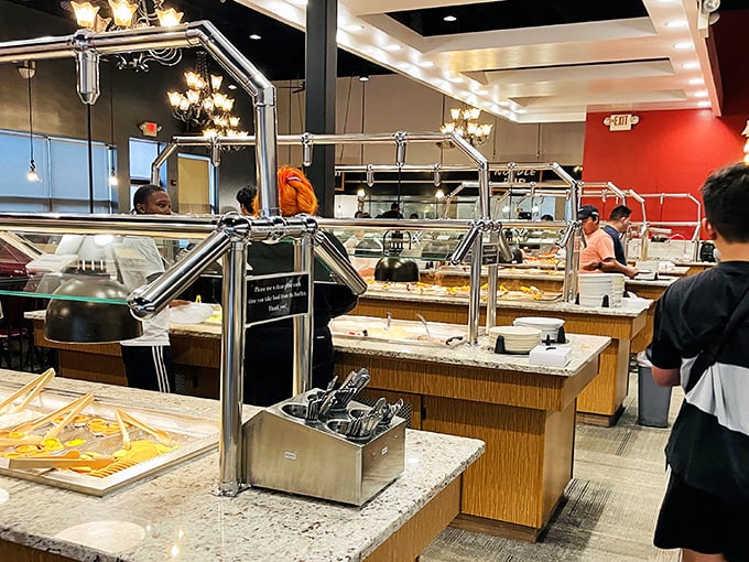 Modern buffet stations gleam under carefully placed lighting, a testament to the fact that "all-you-can-eat" and "elegant" aren't mutually exclusive concepts.