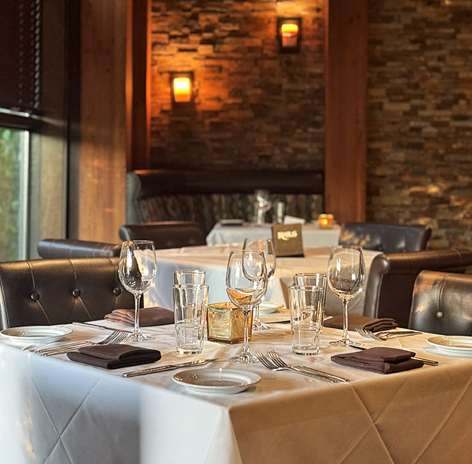 White tablecloths, leather seating, and stone walls create that perfect "special occasion that could happen any day" atmosphere.