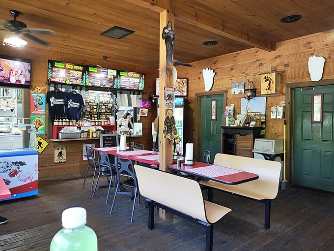 Inside, sasquatch footprints lead you to the counter while wooden beams and bigfoot memorabilia create the perfect cryptid-hunter's dining lodge.
