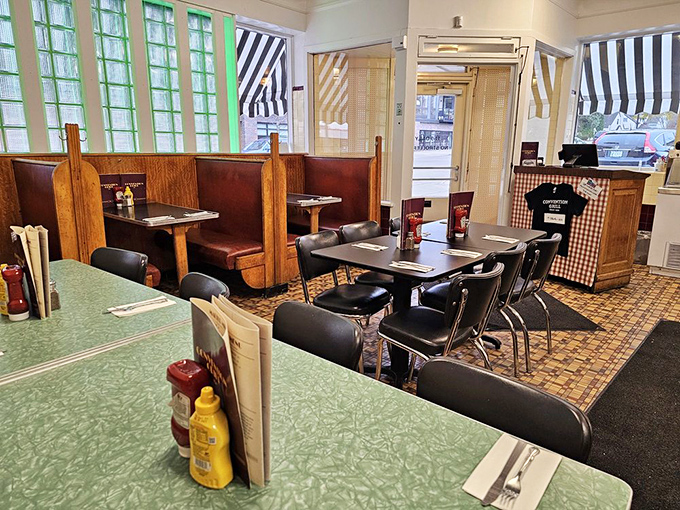 Step inside and time stands still—mint green Formica countertops, wooden booths, and chrome-trimmed stools create the perfect backdrop for Minnesota comfort food classics.