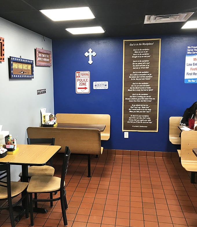 Blue walls adorned with inspirational messages create a no-nonsense dining atmosphere where comfort reigns supreme. This isn't Instagram food&mdash;it's real sustenance for real people.