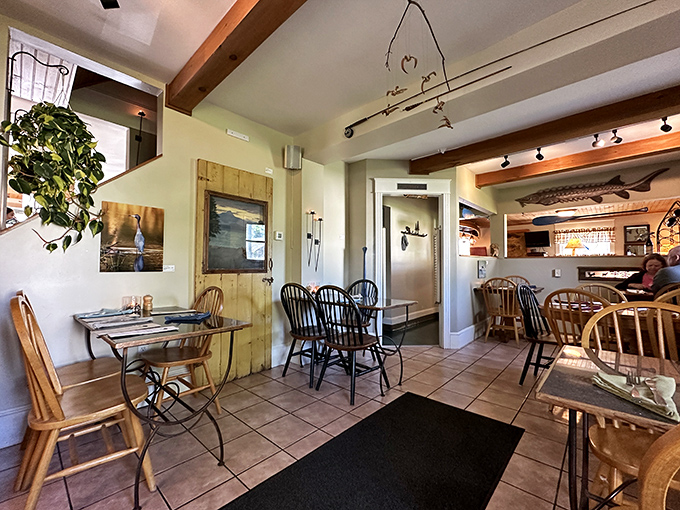 Inside, fishing rods mounted on walls and warm wooden accents create that perfect balance of "nice enough for your anniversary, comfortable enough for Tuesday."