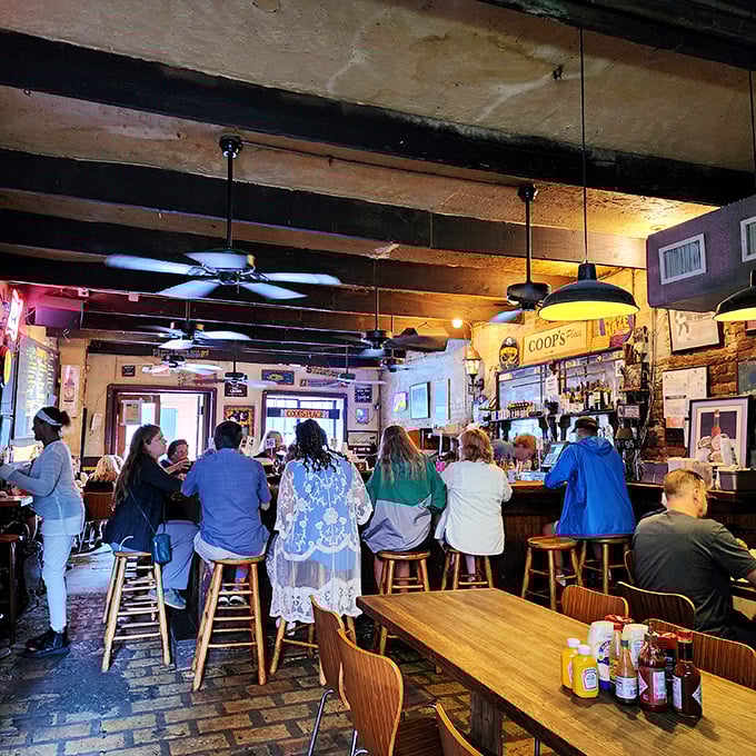 Inside Coop's, the exposed beams and worn bar stools tell stories of countless satisfied diners. It's like time stopped, but the food kept getting better.