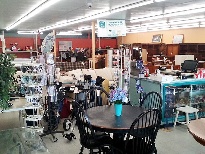 A dining set awaits its next family gathering while furniture stretches into the distance. Every item here has stories to tell.