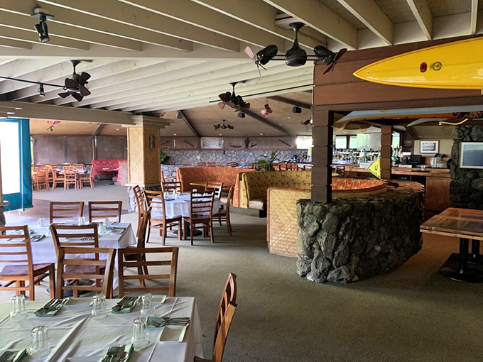 Inside Haleiwa Joe's, island charm meets casual elegance. Those ceiling fans aren't just for show&mdash;they're gently wafting the scent of prime rib throughout the dining room.