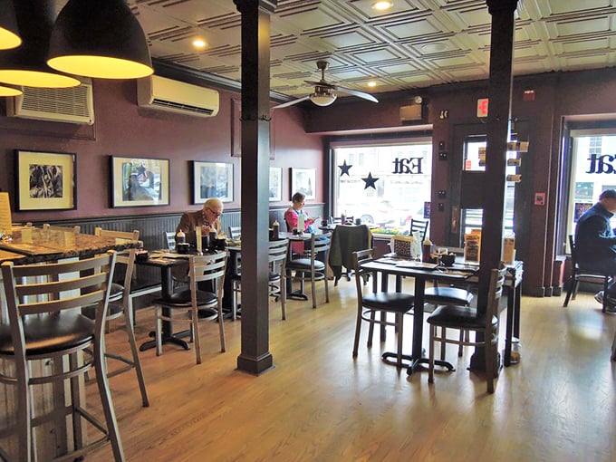 Inside, warm wooden floors meet exposed brick walls and classic tin ceiling tiles, creating that perfect "where everybody knows your name" vibe.