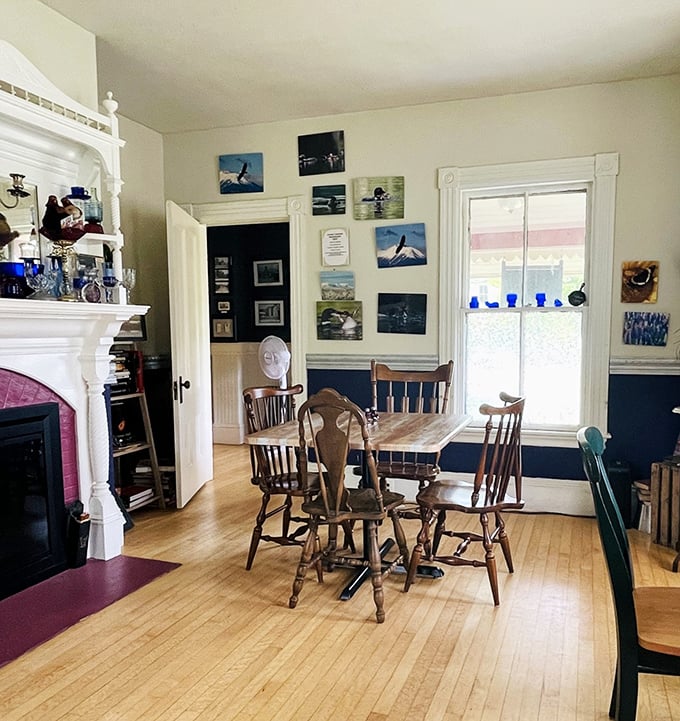 Sunlight streams through tall windows, illuminating a dining space where history and comfort embrace like old friends catching up over coffee.