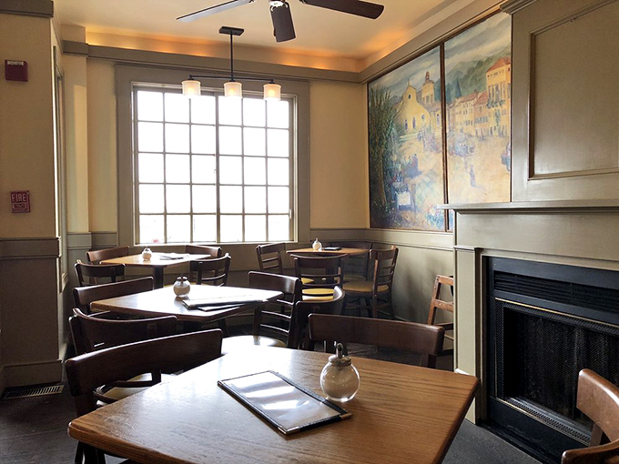 Inside Pastiche, time slows down. The warm lighting, cozy fireplace, and thoughtful artwork create a space where dessert becomes an occasion rather than just a course.