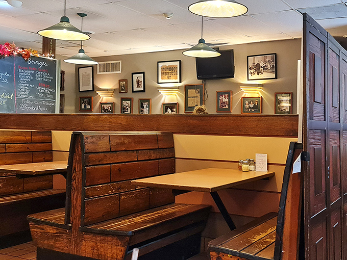 Wooden booths worn smooth by decades of happy diners create that perfect "you've arrived somewhere special" feeling. History lives in these walls.