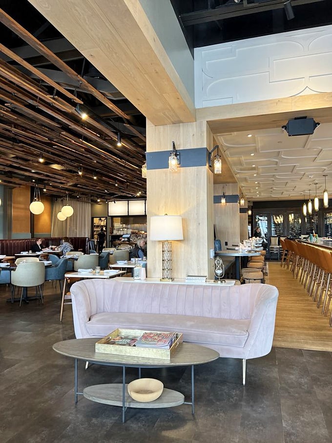 This isn't your grandmother's dining room, unless your grandmother had impeccable taste in modern restaurant design and a velvet sofa.