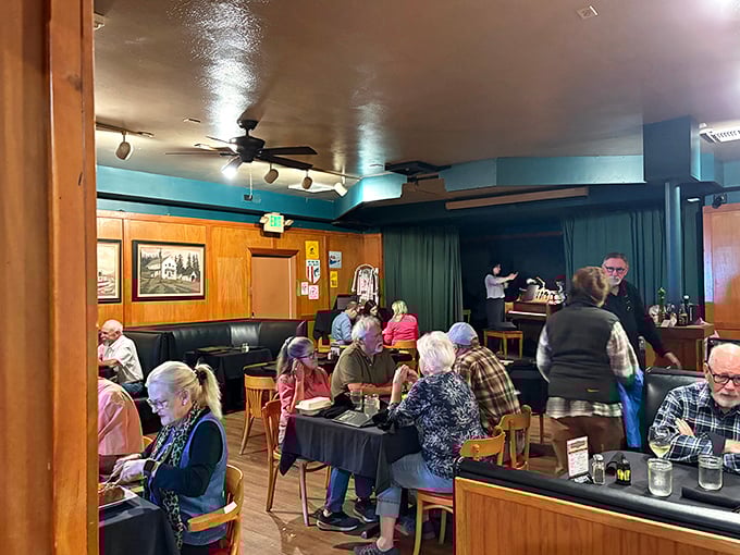 Where locals and visitors mingle over meals worth writing home about. The blue walls and wood paneling create that perfect "welcome home" vibe.