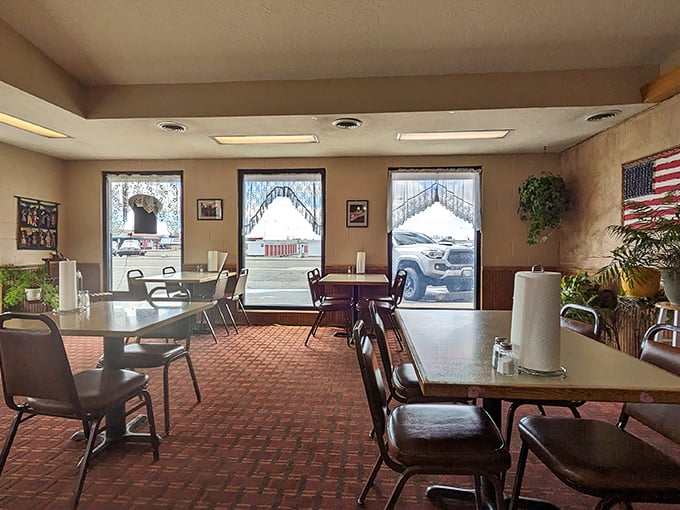 Simple tables, checkered floors, and American flags create the perfect backdrop for the real star&mdash;barbecue that would make a vegetarian reconsider life choices.