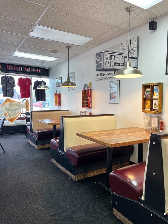 Classic diner booths where memories are made. These burgundy vinyl seats have cradled Alaskans through countless cups of coffee and life-changing conversations.