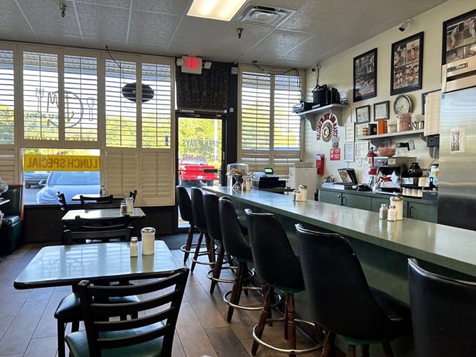 Counter seating: where solo diners become regulars and the coffee keeps flowing as freely as the conversation.