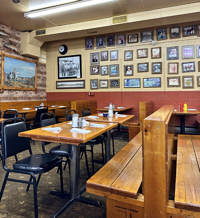 Wall-to-wall memories line this no-nonsense dining room where wooden tables have hosted countless conversations and the photos tell stories between bites.