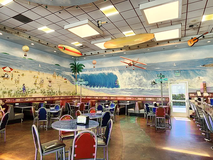 Surfboards suspended from the ceiling and beach murals transport diners to an endless summer, regardless of the actual season.