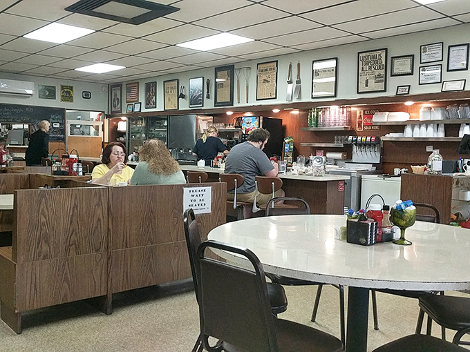 Wood paneling and counter seating &ndash; breakfast's natural habitat. The interior feels like stepping into a time capsule where coffee is always fresh.