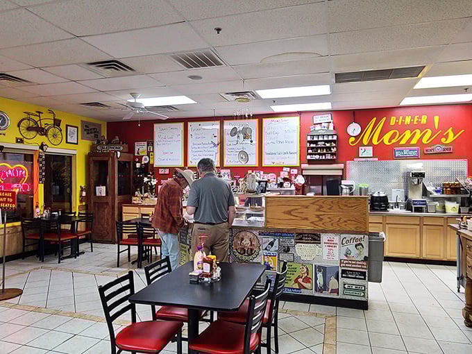 Step inside and the vibrant yellow and red walls instantly signal you're in flavor country. That bicycle on the wall? It's how you'll need to get home after these portions.