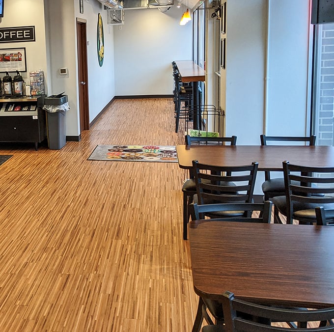 Simple wooden tables invite you to sit and contemplate life's big questions—like whether to try the fritter or cruller first.