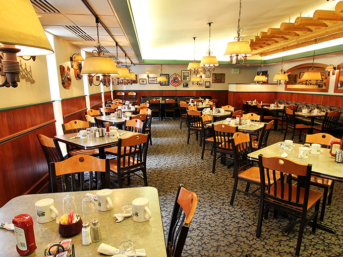 Inside, warm wood paneling and classic diner tables create that perfect "everybody knows your name" vibe&mdash;minus Norm and Cliff.