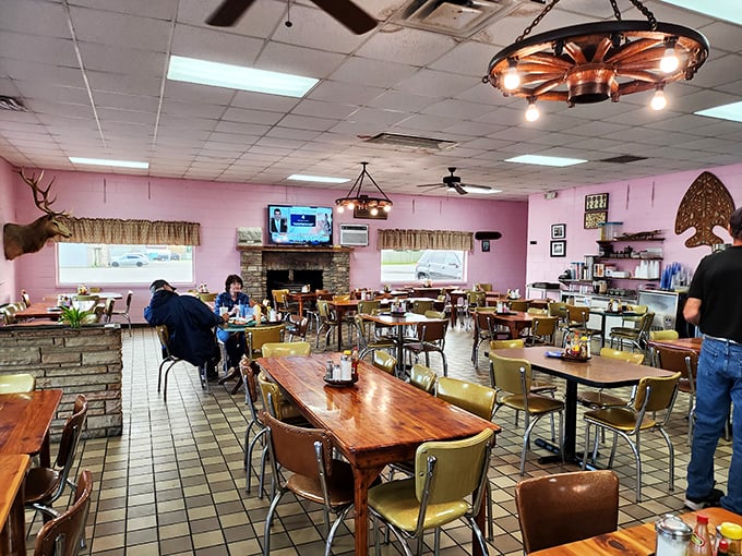 Step inside and time slows down &ndash; wagon wheel chandeliers, mounted trophies, and pink walls create a dining room that feels like Arkansas's living room.