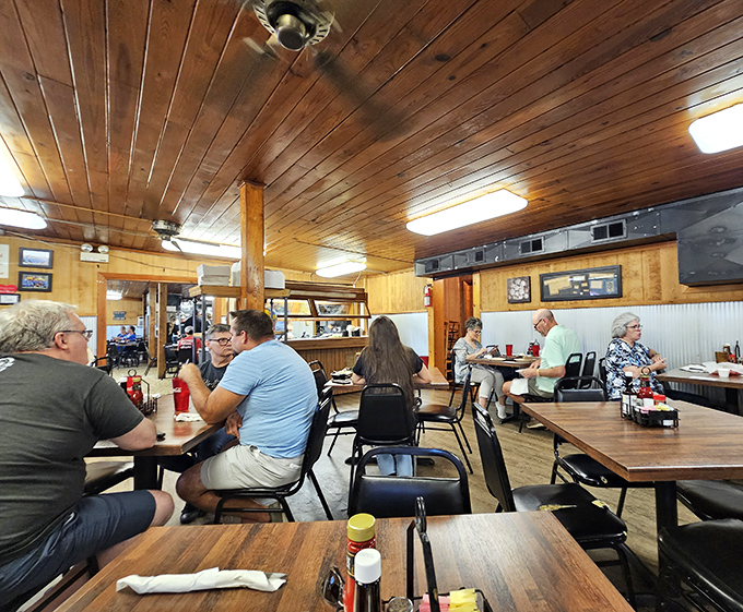 Wood-paneled warmth welcomes diners into a temple of simplicity where the focus remains squarely on what matters most—exceptional steaks.