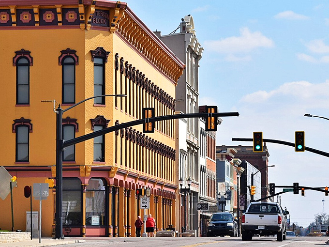 The Burns Block building stands as a golden sentinel on Walnut Street, its Victorian details a reminder that beauty doesn't require a premium price tag.